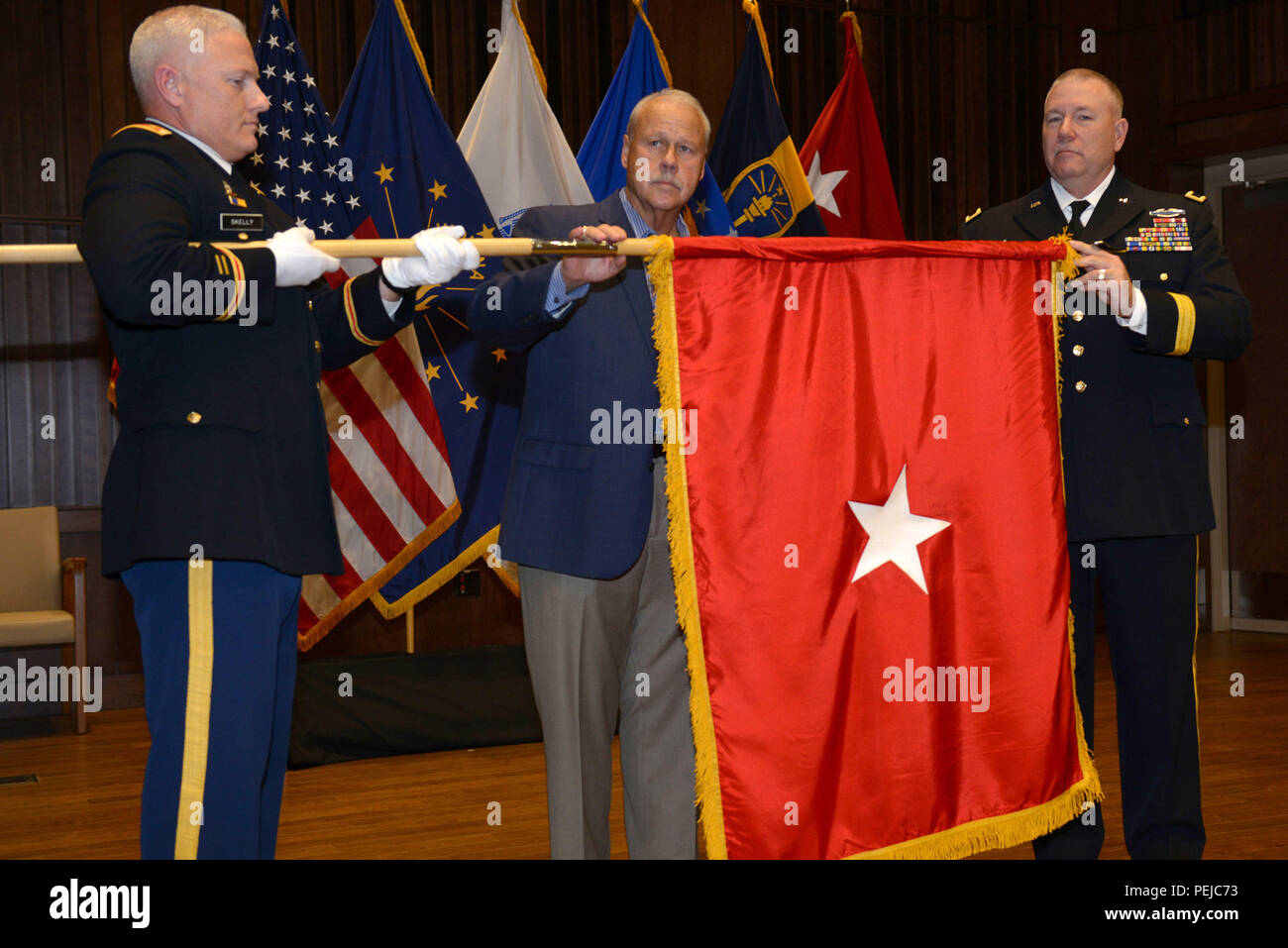 Indiana Army National Guard Brig. Gen. Ronald A. Westfall, right, helps ...