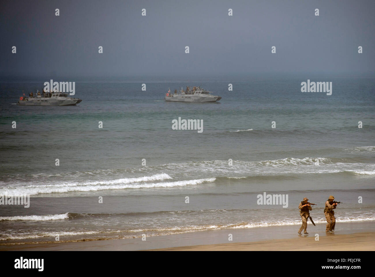 U.S. Marines participate in a beach assault demonstration as Secretary ...