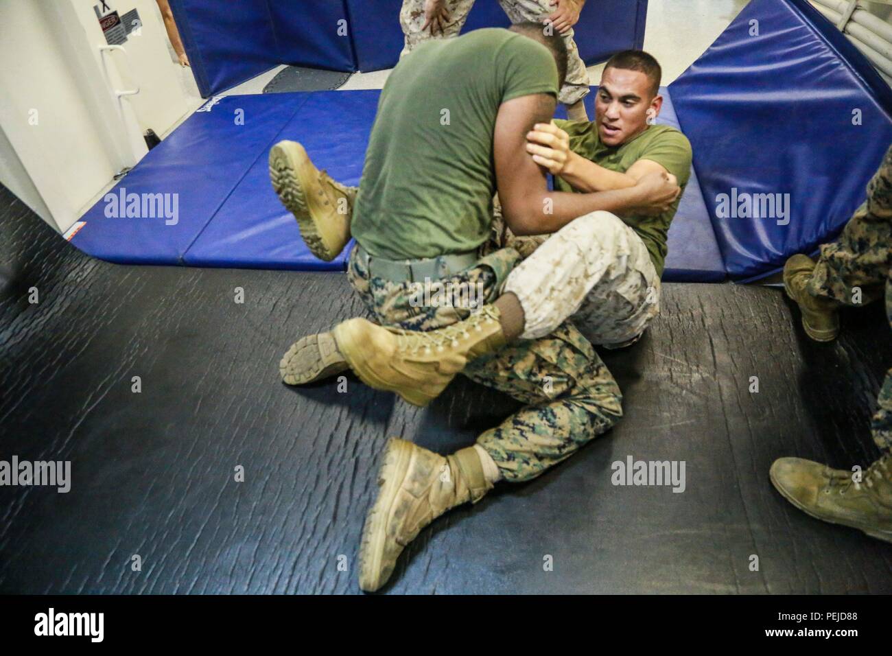 GULF OF ADEN (Aug. 28, 2015) U.S. Marine Cpl. Jose Martinez, right ...