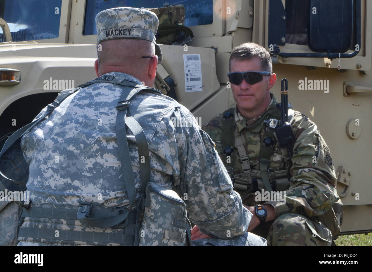 U.S. Army Col. Thomas Mackey, left, commander of the Joint ...