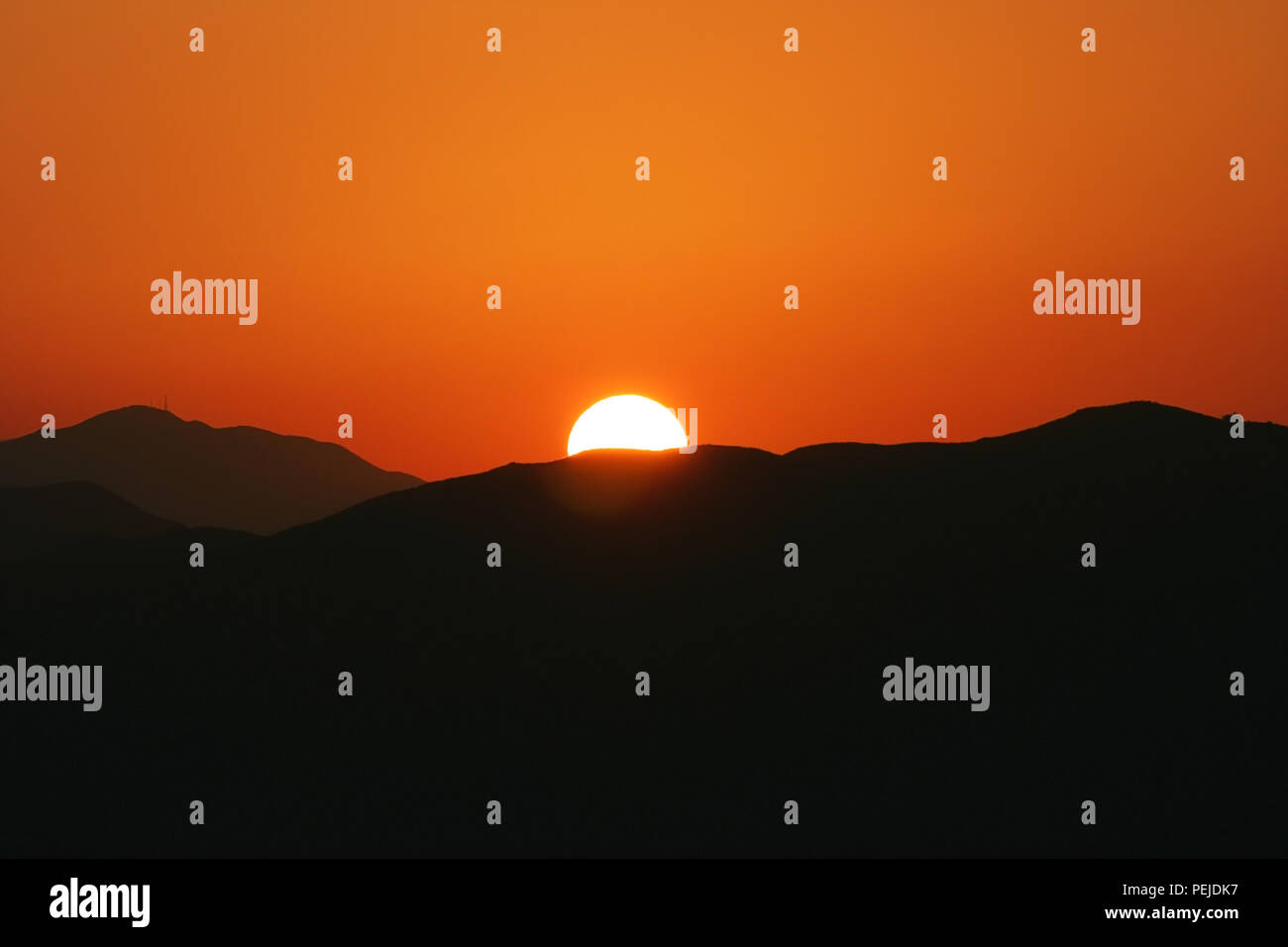 Sunset golden hour, magic hour, gorgeous golden tones, orange sun with ...