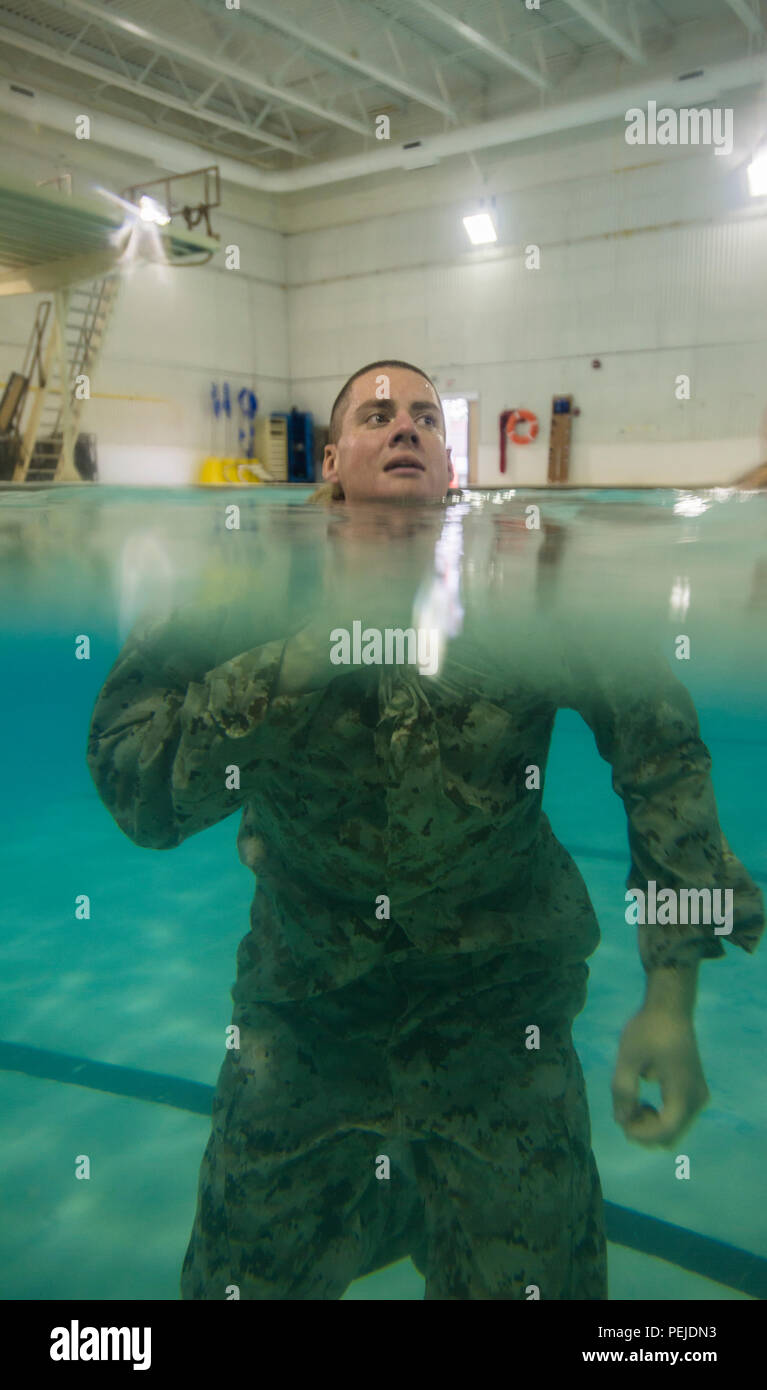 A U.S. Marine attempts to float as part of the annual basic swim ...