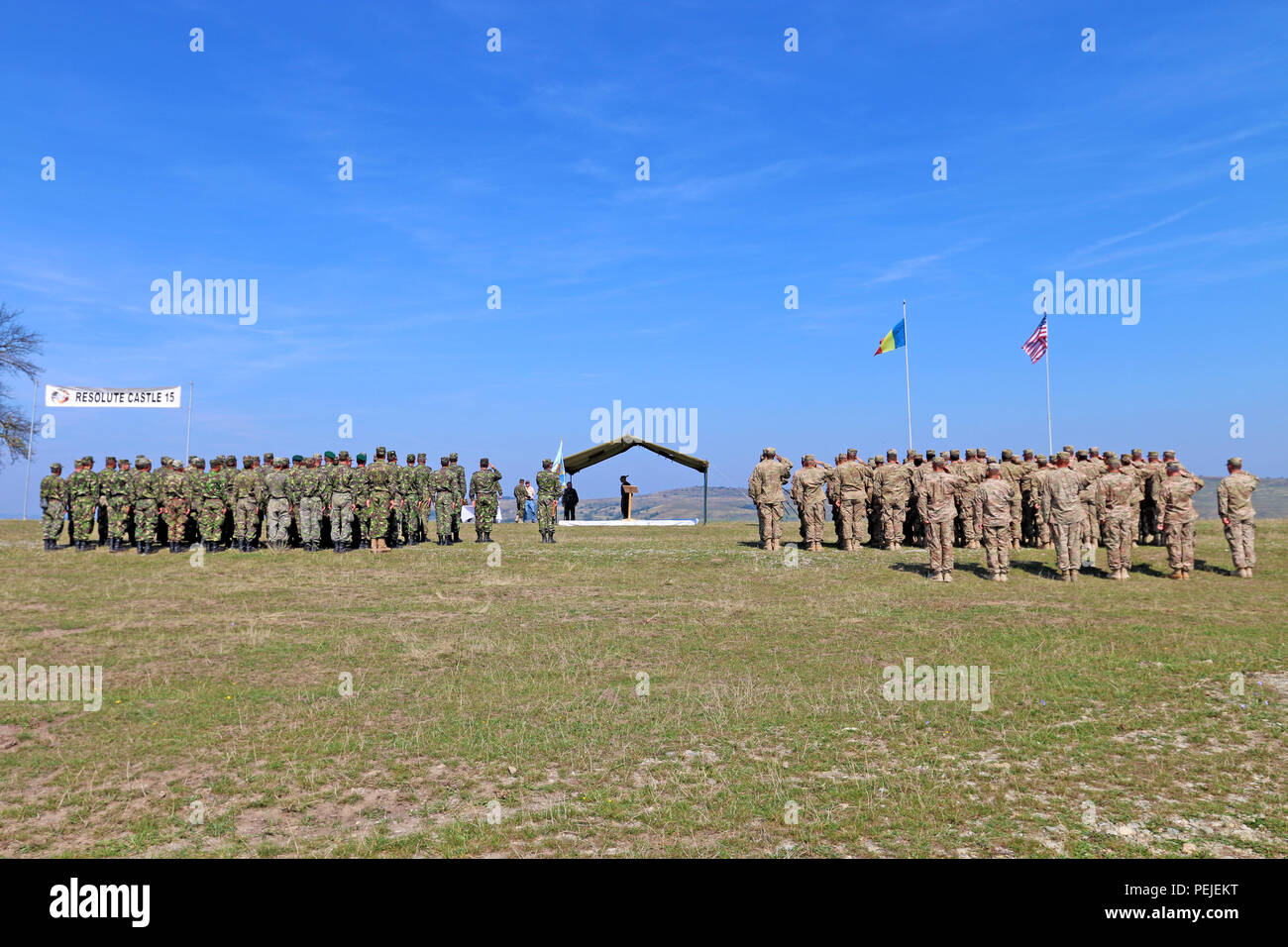 The 877th Engineer Battalion and their Romanian counterparts stand in ...