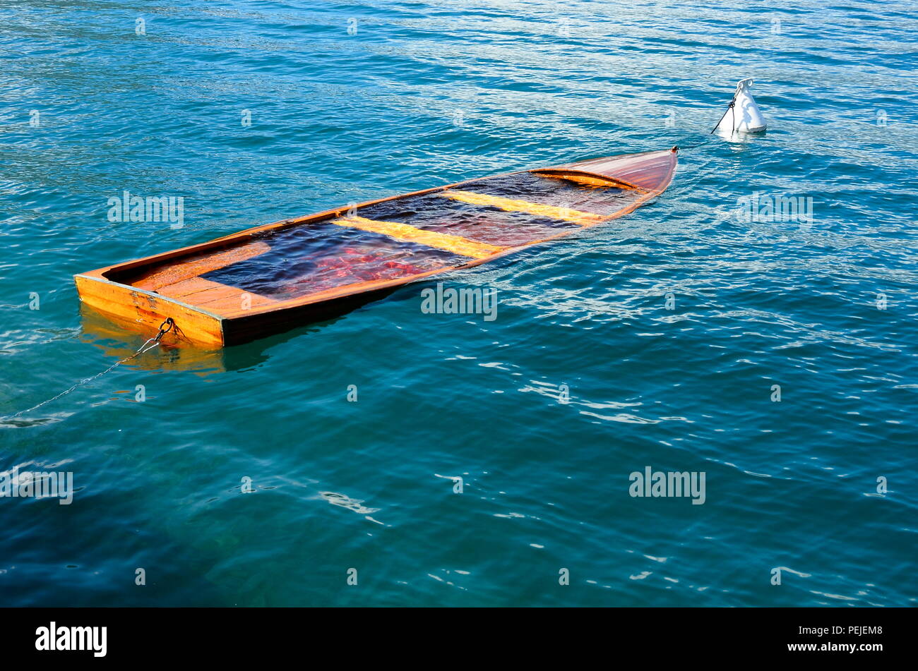 Small boat sinking hi-res stock photography and images - Alamy