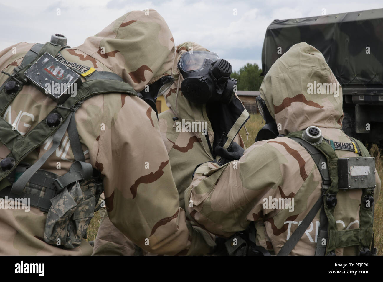 U.S. Army Pfc. Elvin Henriquez, left, and Sgt. Travis Hernandez, right ...