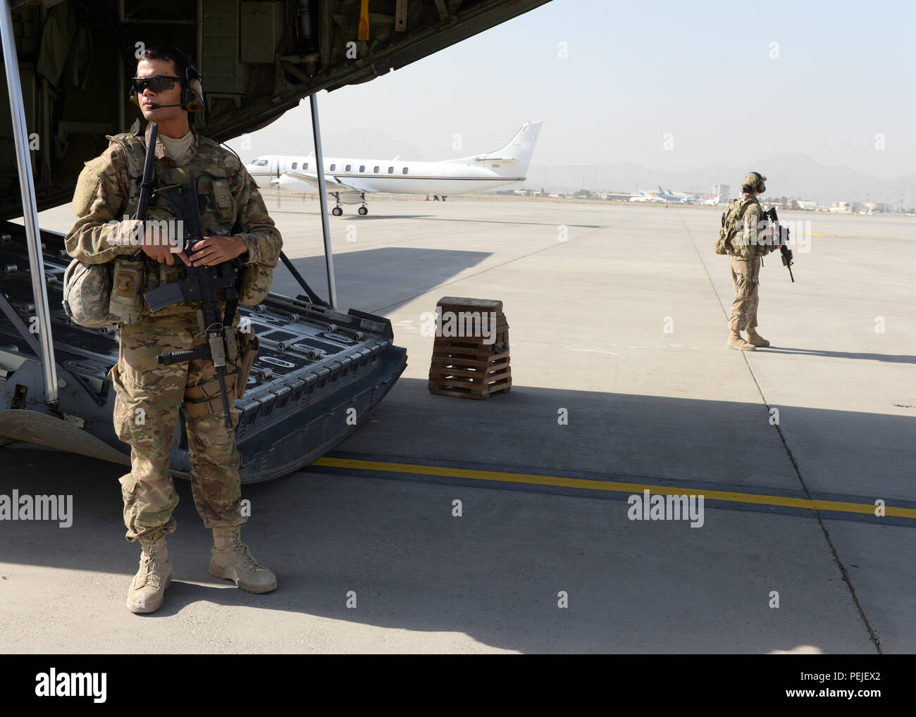 U.S. Air Force Airman 1st Class Wilmer Puello, left, and Staff Sgt ...
