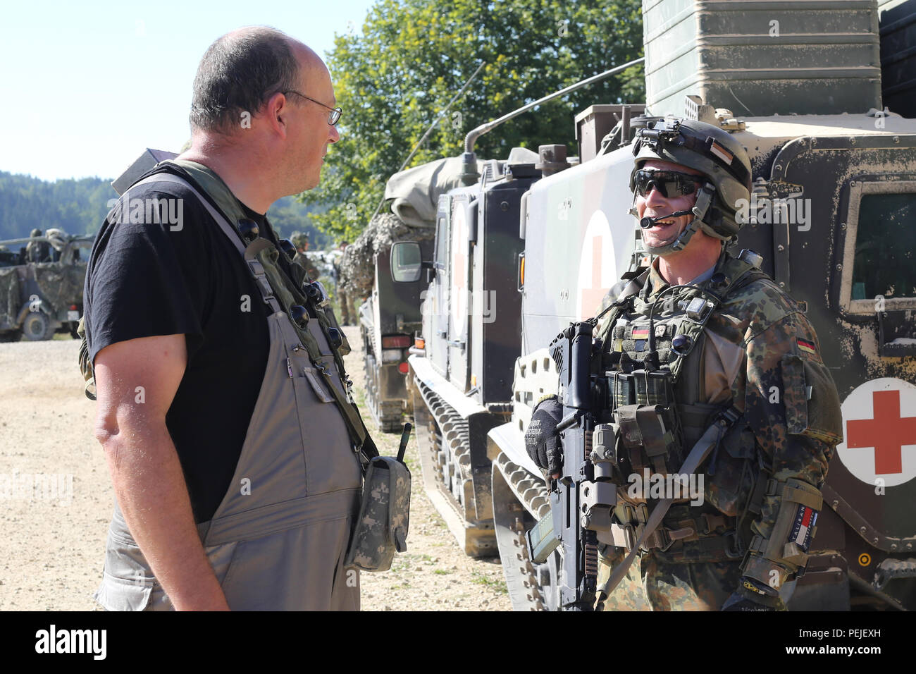 German Army Master Sgt. Alex Pfeiffer, right, of 6th Company, 26th ...