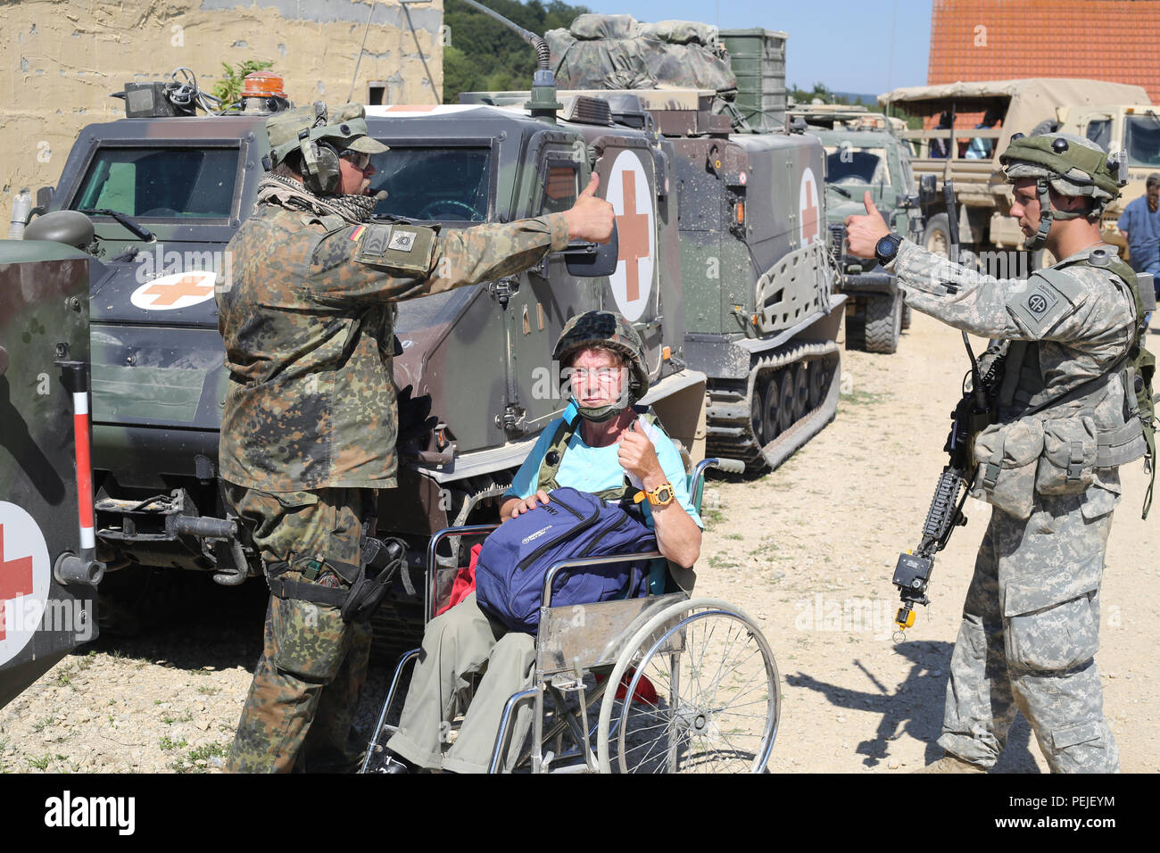 German Army Sgt. 1st Class Matthais Dorn, left, of 6th Company, 31st ...