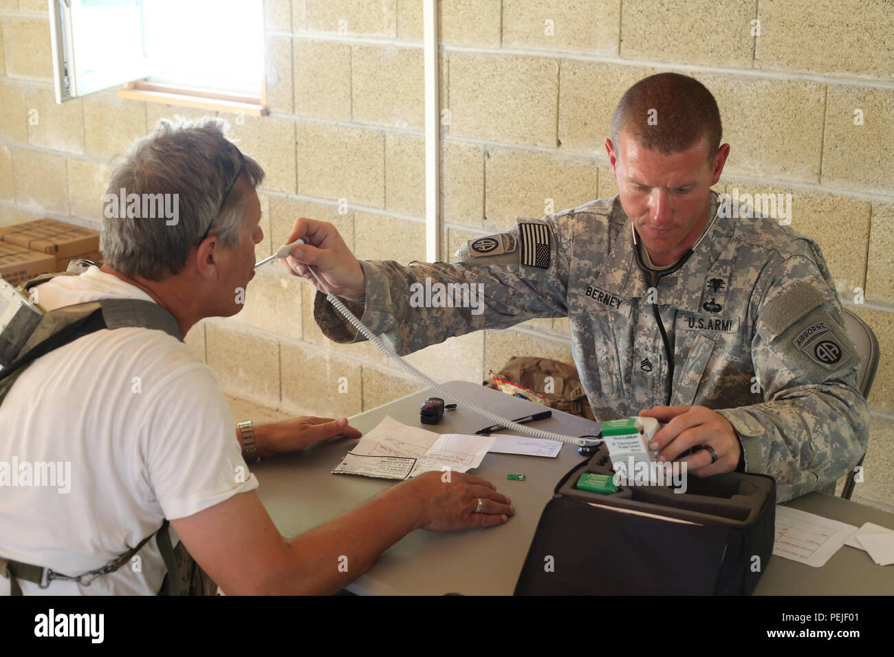 U.S. Army Staff Sgt. Matthew Berney, right, of 127th Engineer Battalion ...