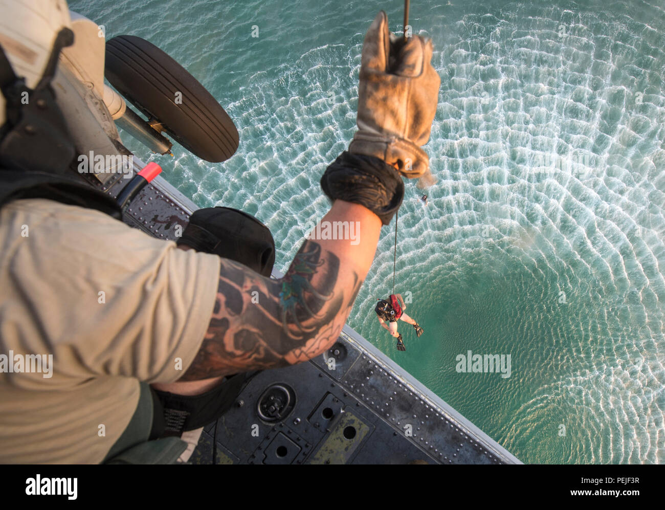 ARABIAN GULF (Aug. 15, 2015) – Search and Rescue (SAR) swimmers ...