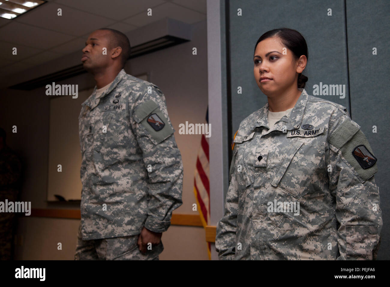 U.S. Army 1st Sgt. Endesha Johnson, and Spc. Lisa Soy, both assigned to 55th Signal Company ...
