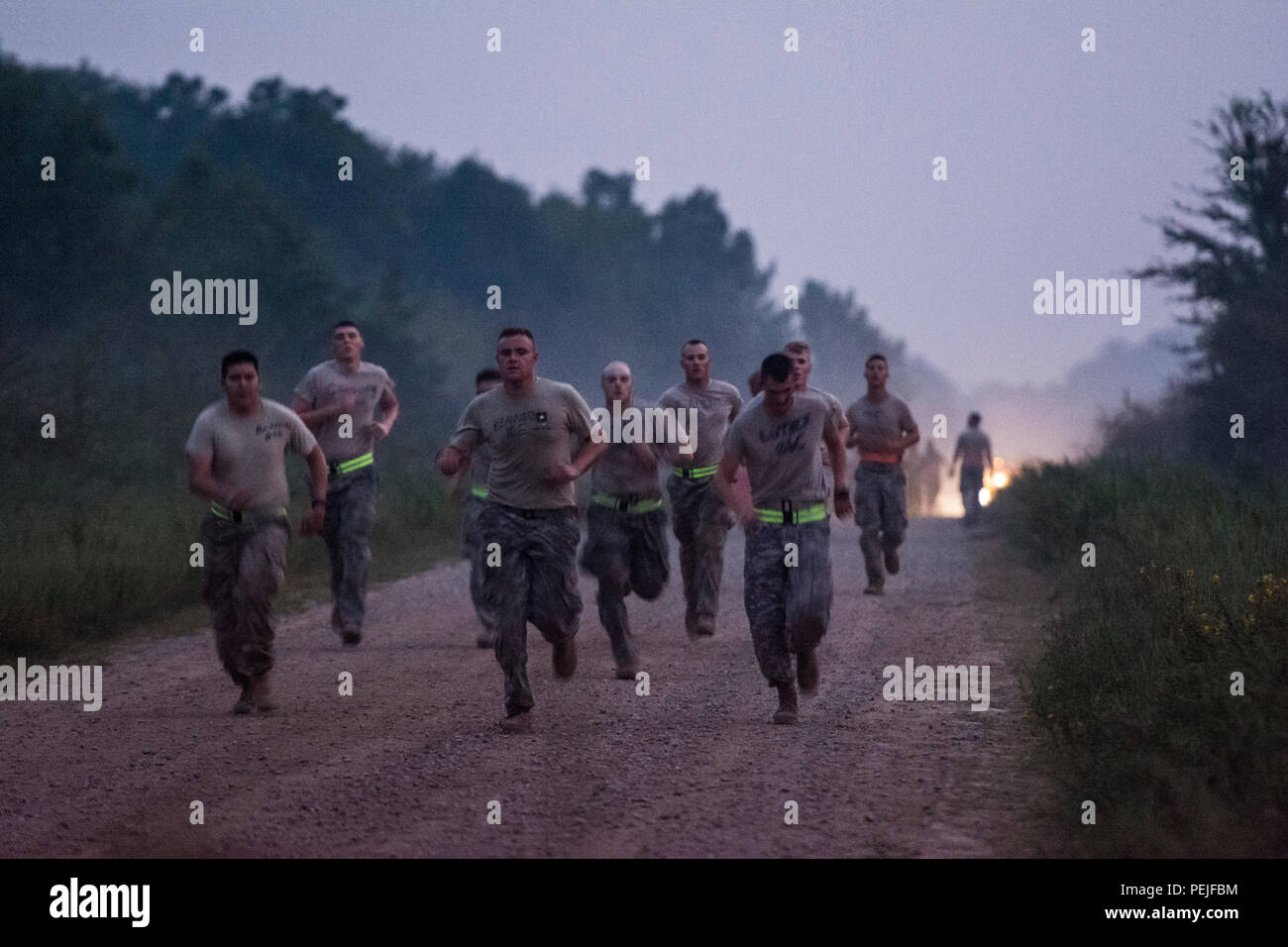U.S. Army Reserve and National Guard combat engineer run toward the ...