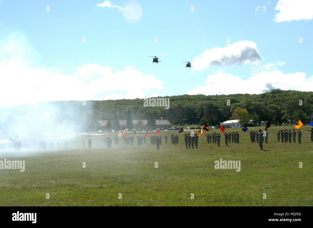 Smoke from M-177 howitzer cannon-fire hovers over the parade field as ...