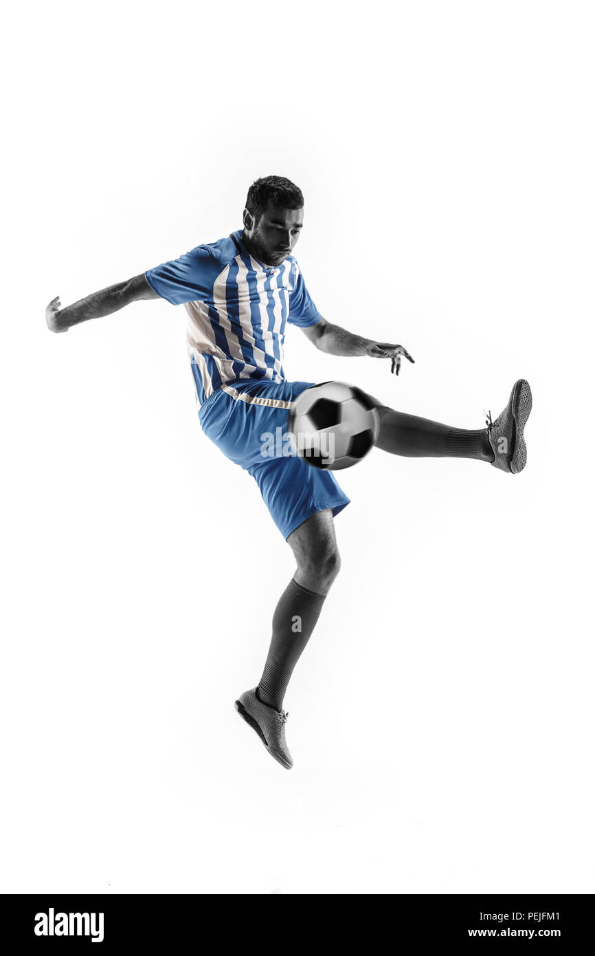 Professional football soccer player with ball isolated on white studio ...