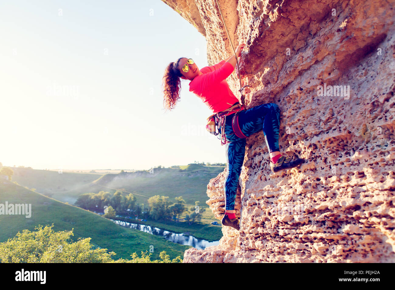 Girl walking over rocks hi-res stock photography and images - Alamy