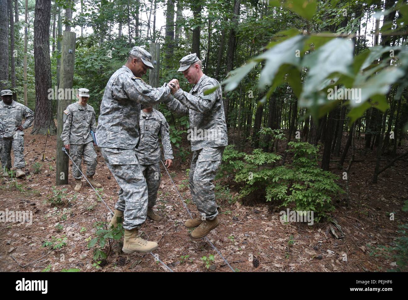 U.S. Army 1st Sgt. Endesha Johnson and Maj. Stewart Brown, assigned to the 55th Signal Company ...