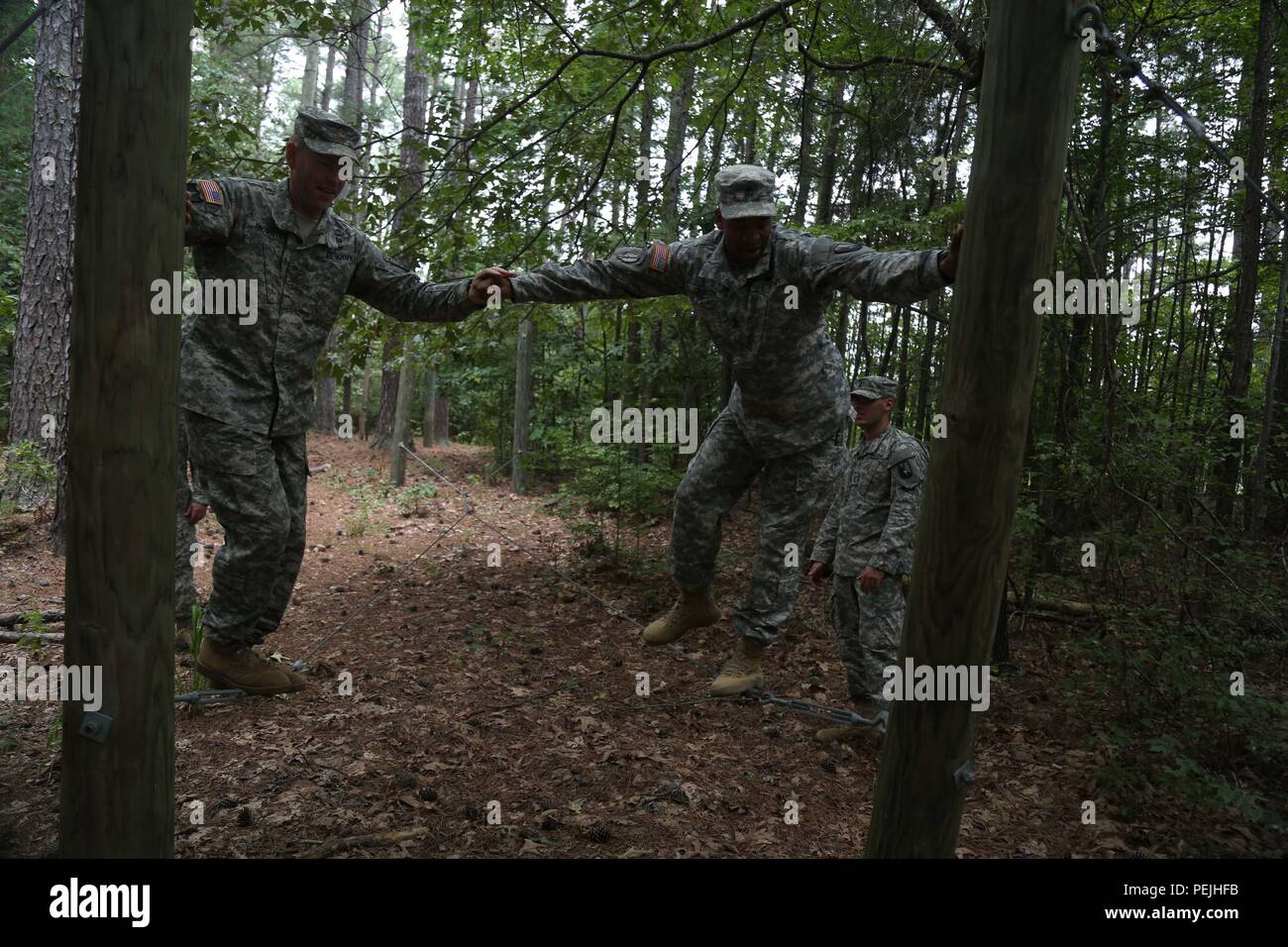 U.S. Army Maj. Stewart Brown and 1st Sgt. Endesha Johnson, assigned to the 55th Signal Company ...