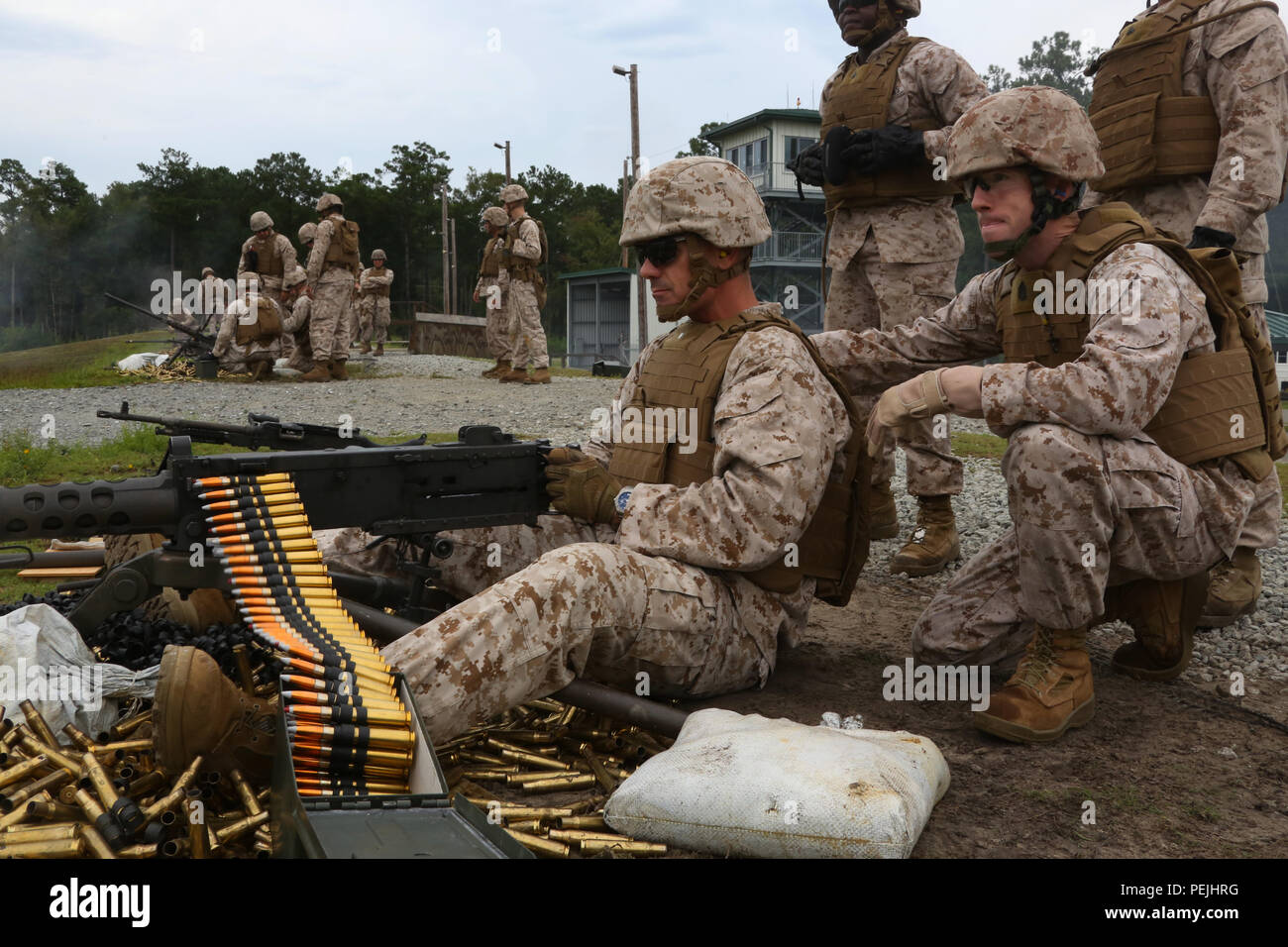 Lt. Col. Jeremy S. Winters, left, and Gunnery Sgt. Clifford Bowen fire ...