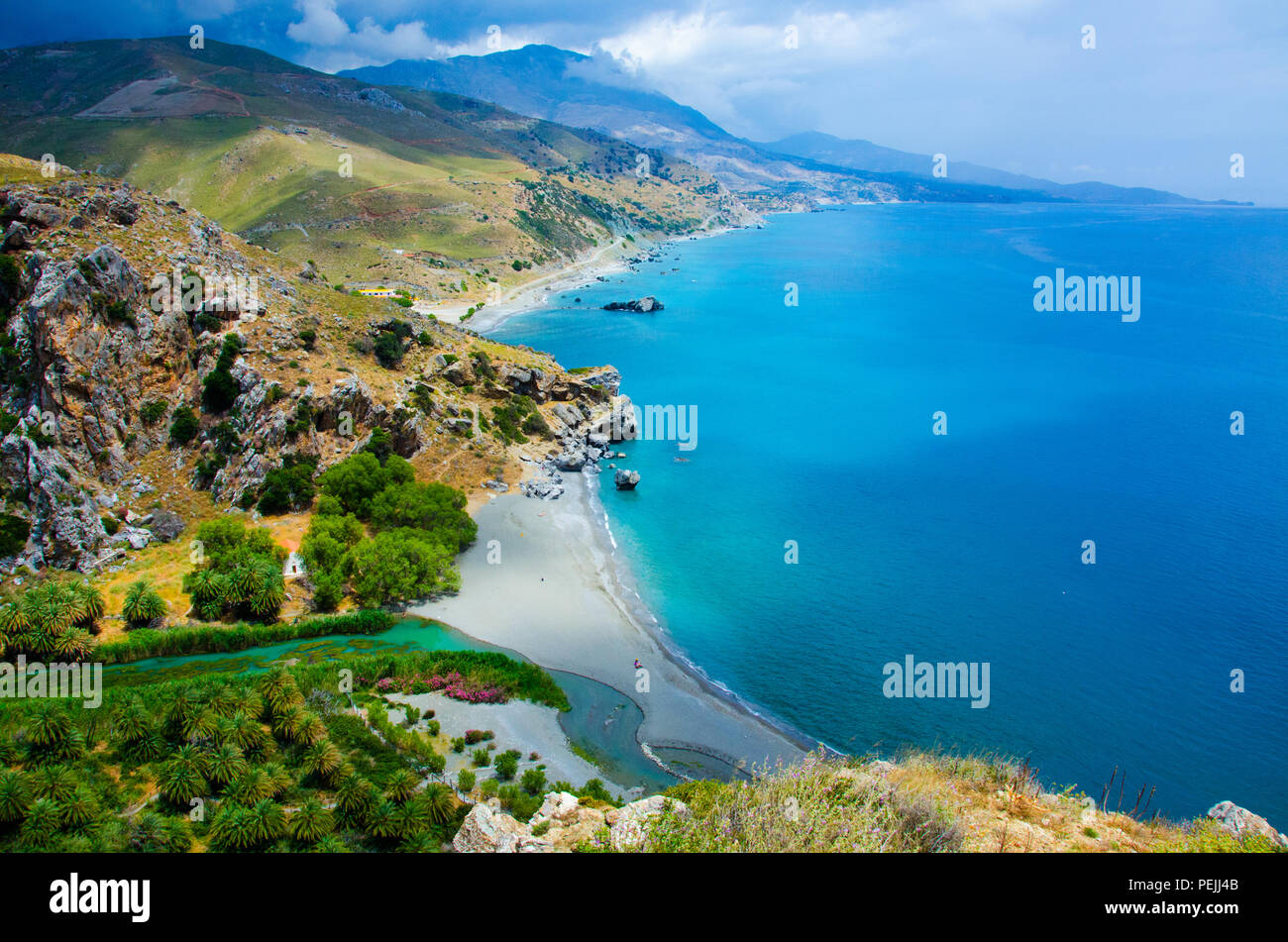 Preveli beach at Libyan sea, river and palm forest, paradise coast of ...