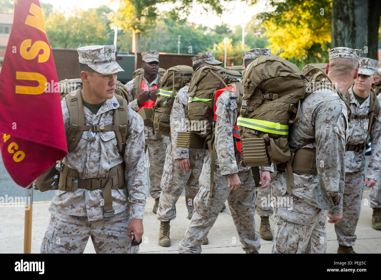 U.S. Marine Corps Sgt. Daniel Kim stands in formation after finishing a ...