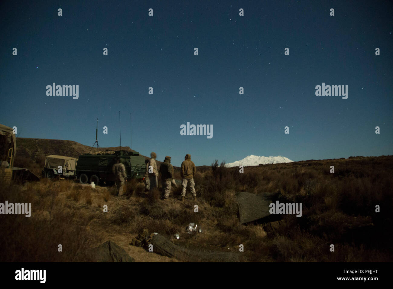 New Zealand Army Soldiers and U.S. Marines await to see illumination ...