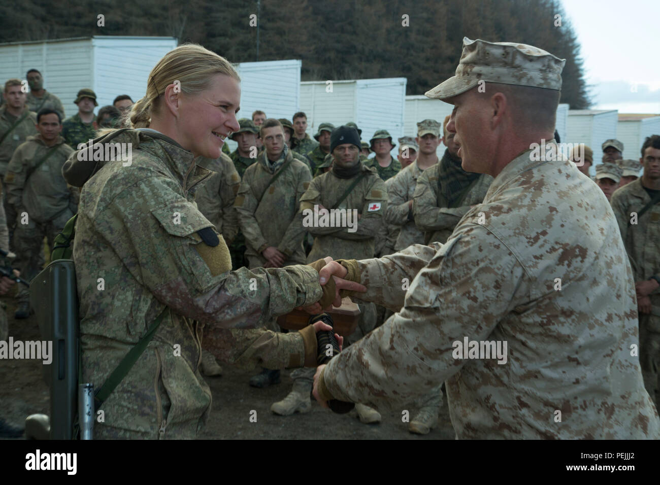 U.S. Marine Maj. Terry Heichelbech, right, presents New Zealand Army ...