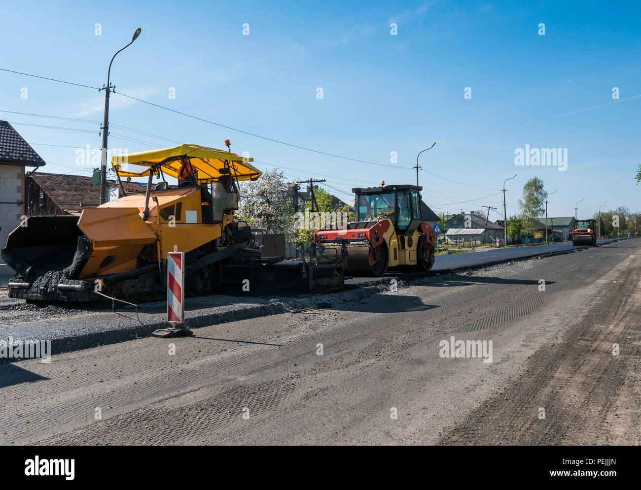 Asphalt placing machine hi-res stock photography and images - Alamy