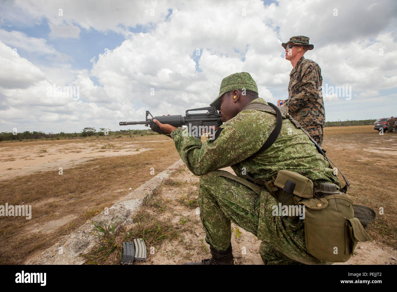 A Belizean soldier with 2nd Battalion, Belize Defence Force, fires from ...