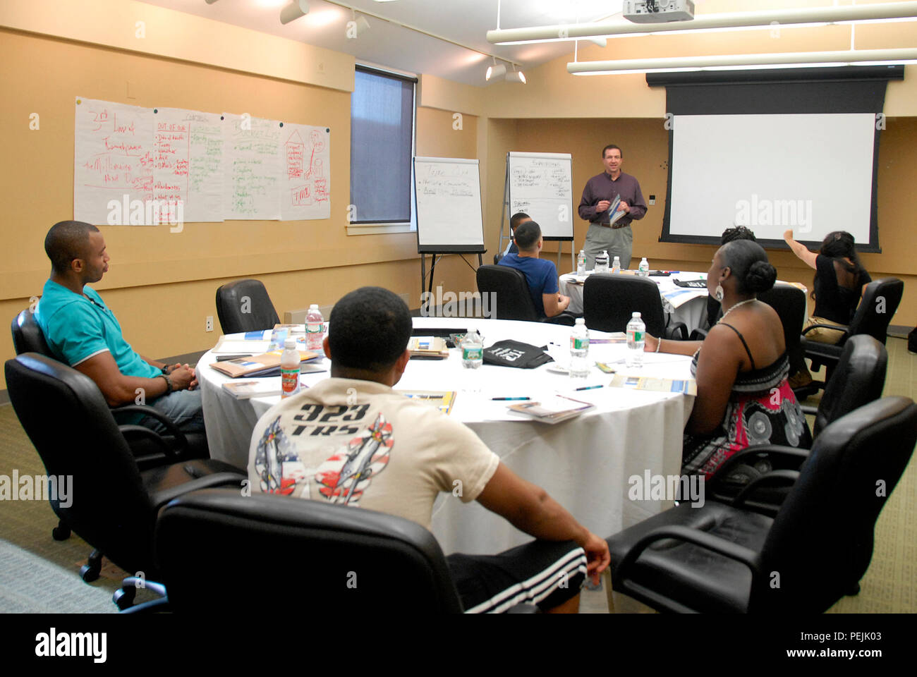 Lt. Col. James D. Buckman, a 108th Wing chaplain, instructs single ...