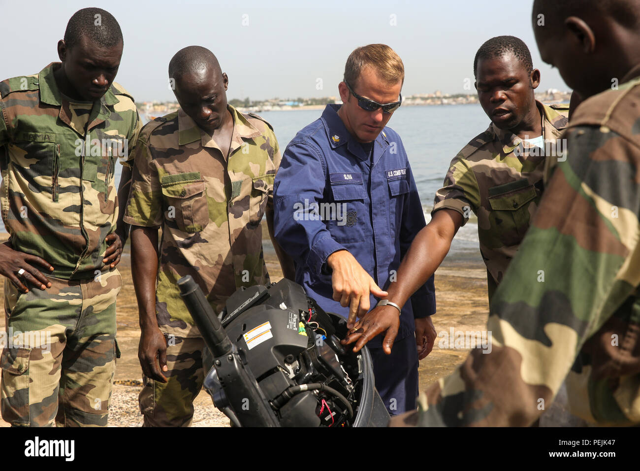 U.S. Coast Guard Petty Officer 2nd Class Dustin Sliva, a machinery ...