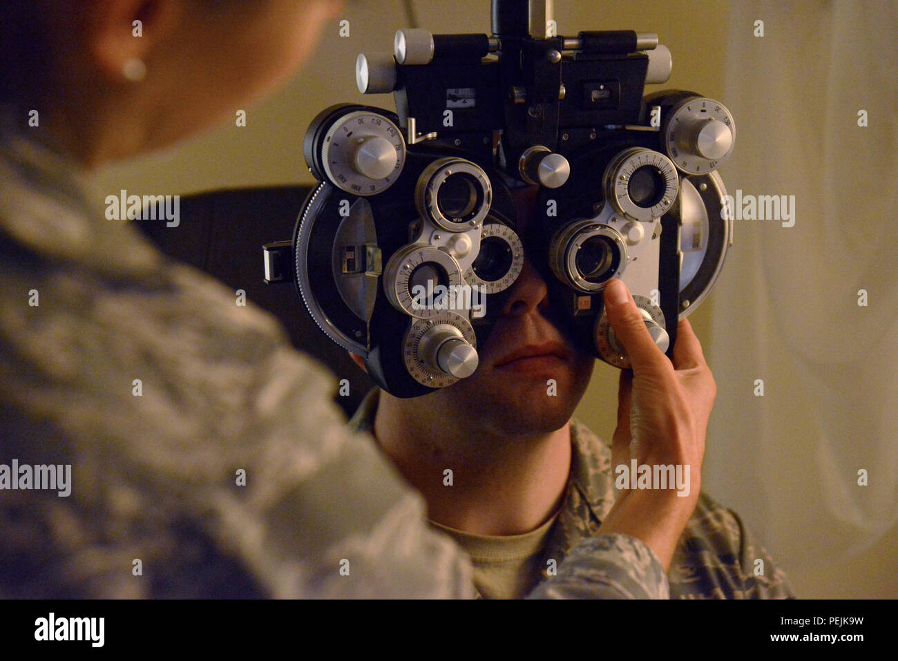 Air Force Capt. Lauren Fundler (left), 673rd Medical Group optometrist ...