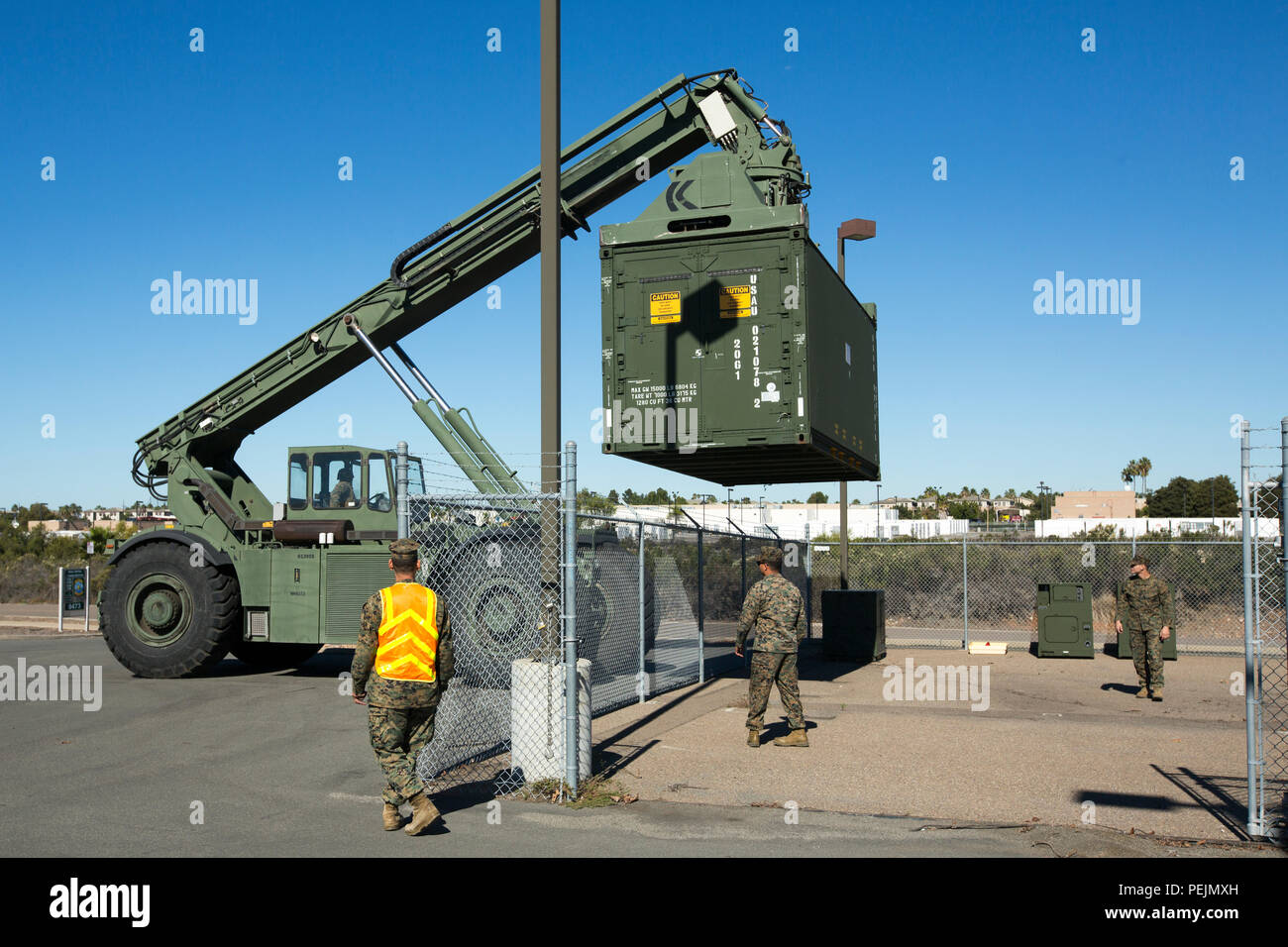 U.S. Marine Corps Lance Cpl. Andre Powell, a heavy equipment operator ...