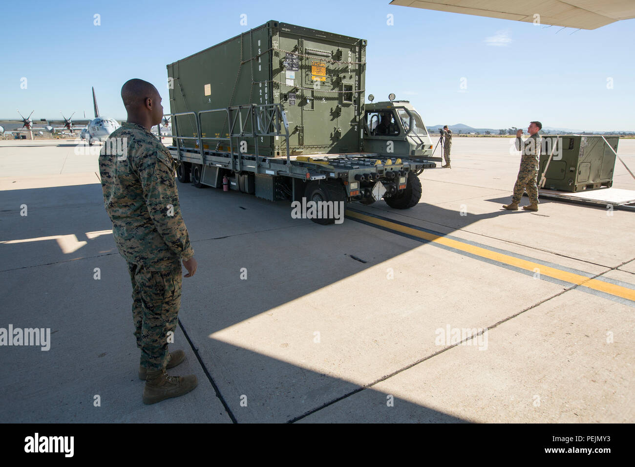 U.S. Marine Corps Sgt. Addison Evans, the embark chief of 3d Marine ...