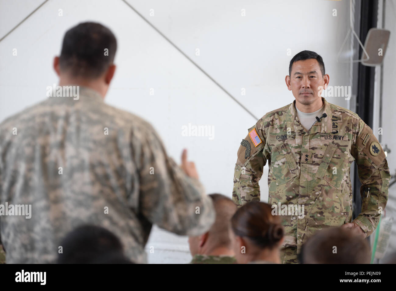 U.S. Army Maj. Gen. K.K. Chinn, Army South commander, listens to a ...