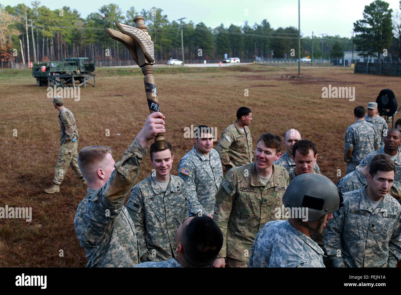 The winners of the Pathfinder Torcher hold up their golden torch, a ...