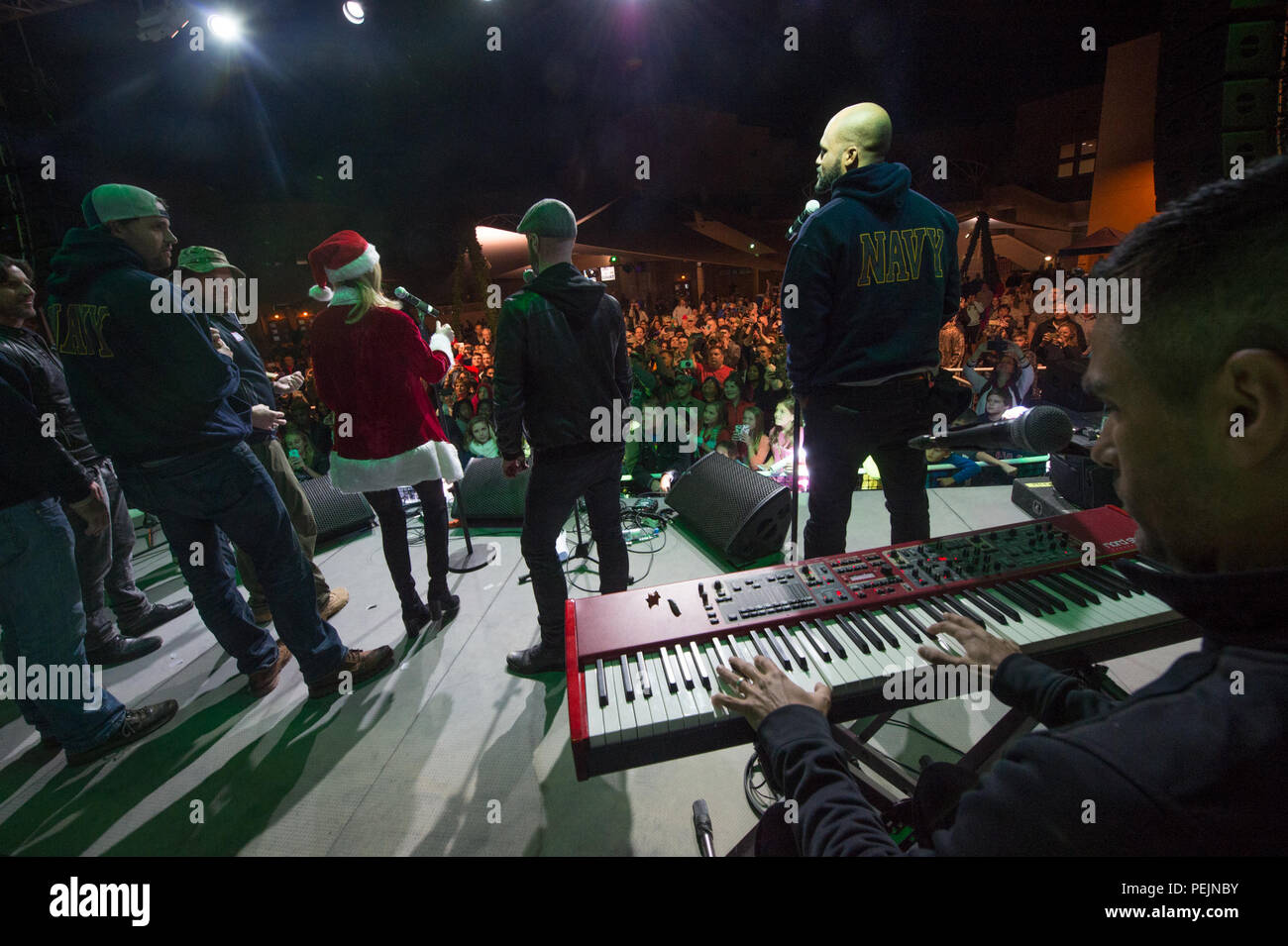 US service members and their families during a USO show at Naval ...
