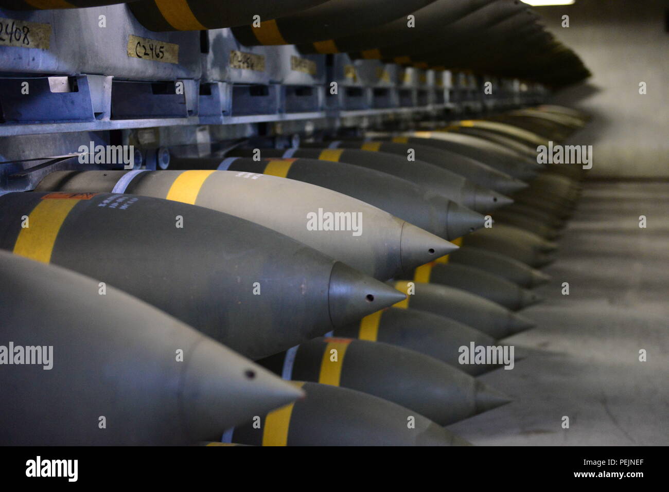 Rows of bombs fill a munitions storage bunker at Osan Air Base ...