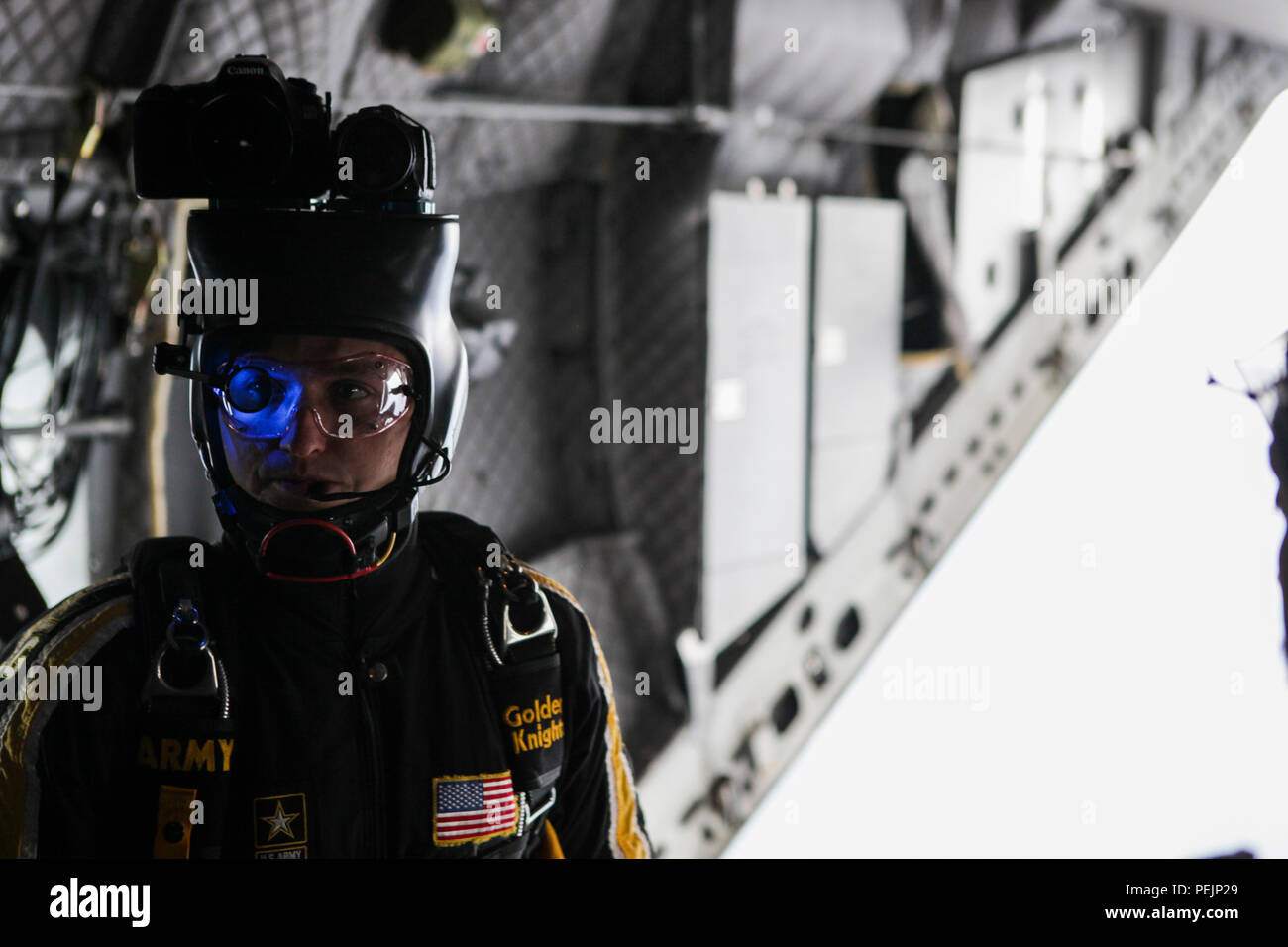 U.S. Army "Golden Knights" Parachute Team member, prepares to execute a ...