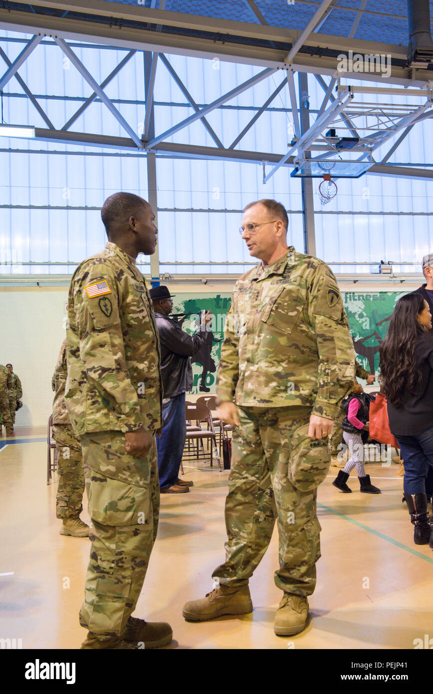 U.S. Army Lt. Gen. Ben Hodges, USAREUR Commanding General, speaks with ...