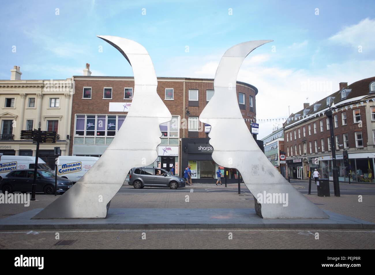 Bedford sculpture faces in Bedford Uk Stock Photo - Alamy