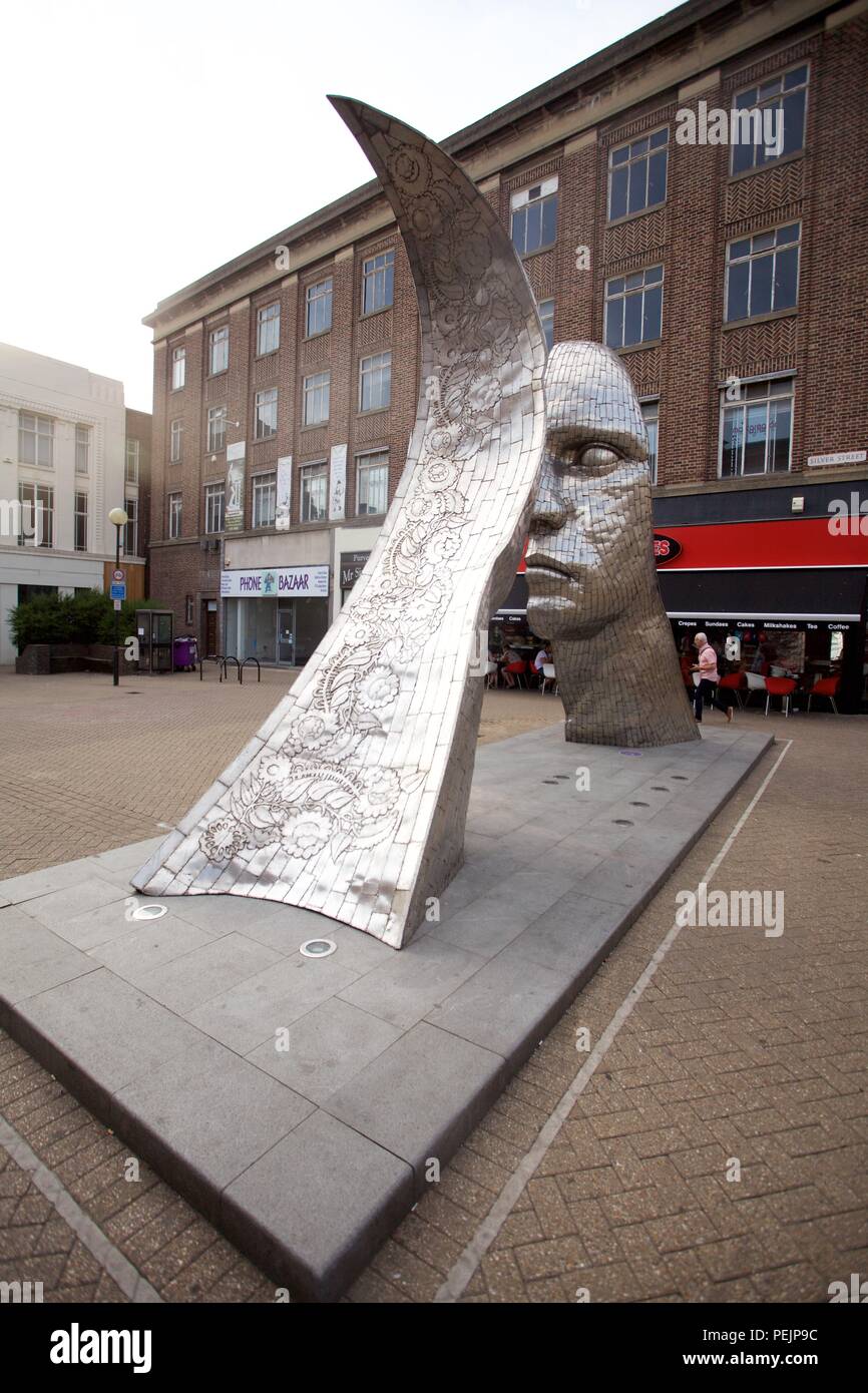 Bedford sculpture faces in Bedford Uk Stock Photo - Alamy