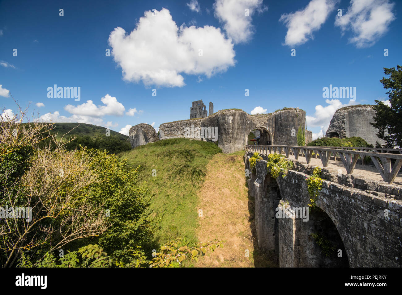 Main entrance bridge to Corfe Castle near Wareham, Dorset, UK Stock ...