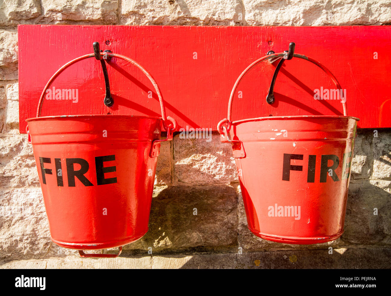 Fire buckets at the Swanage Railway, Corfe Castle train station, Dorset ...