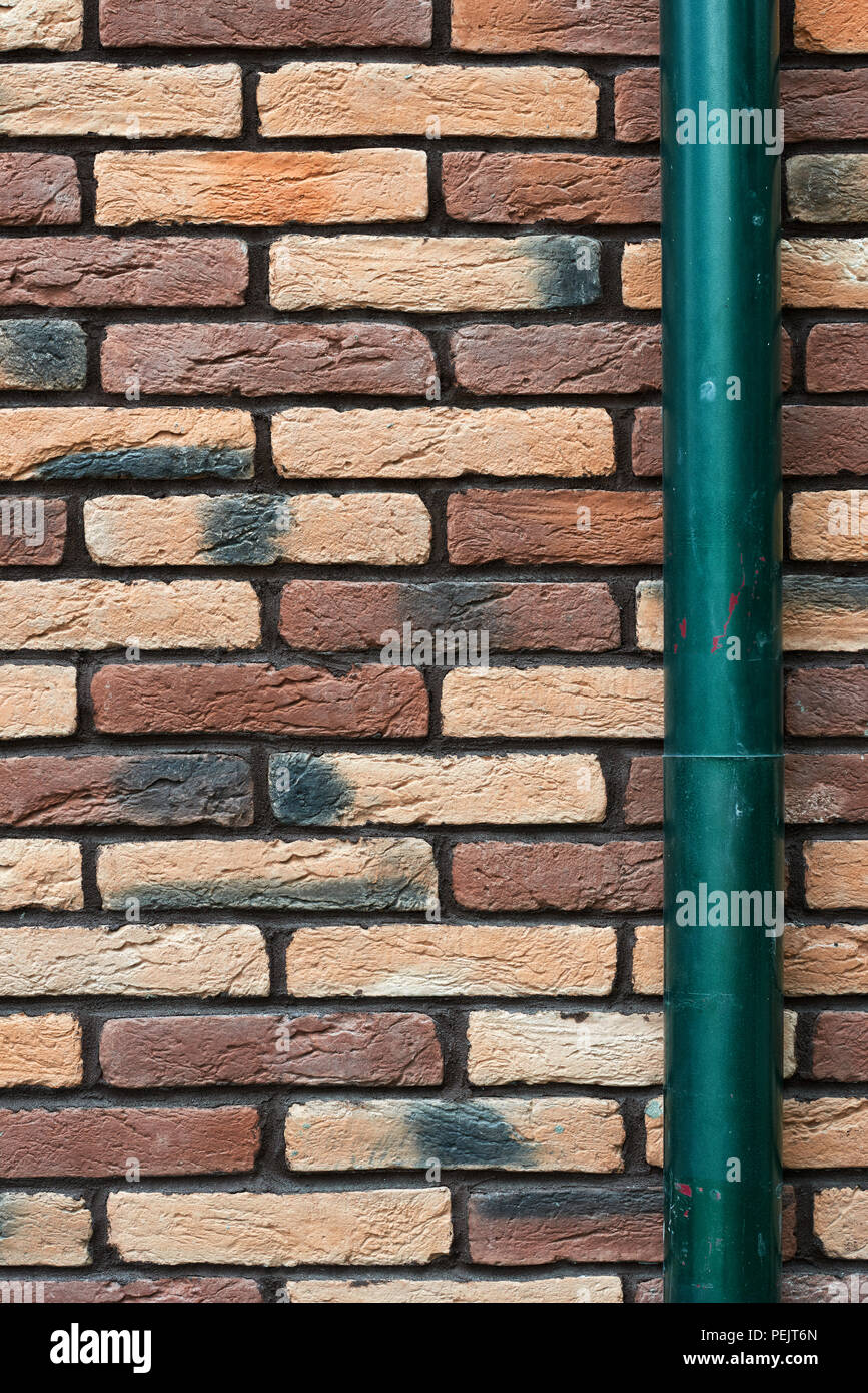 brick wall and drainpipe as background Stock Photo - Alamy