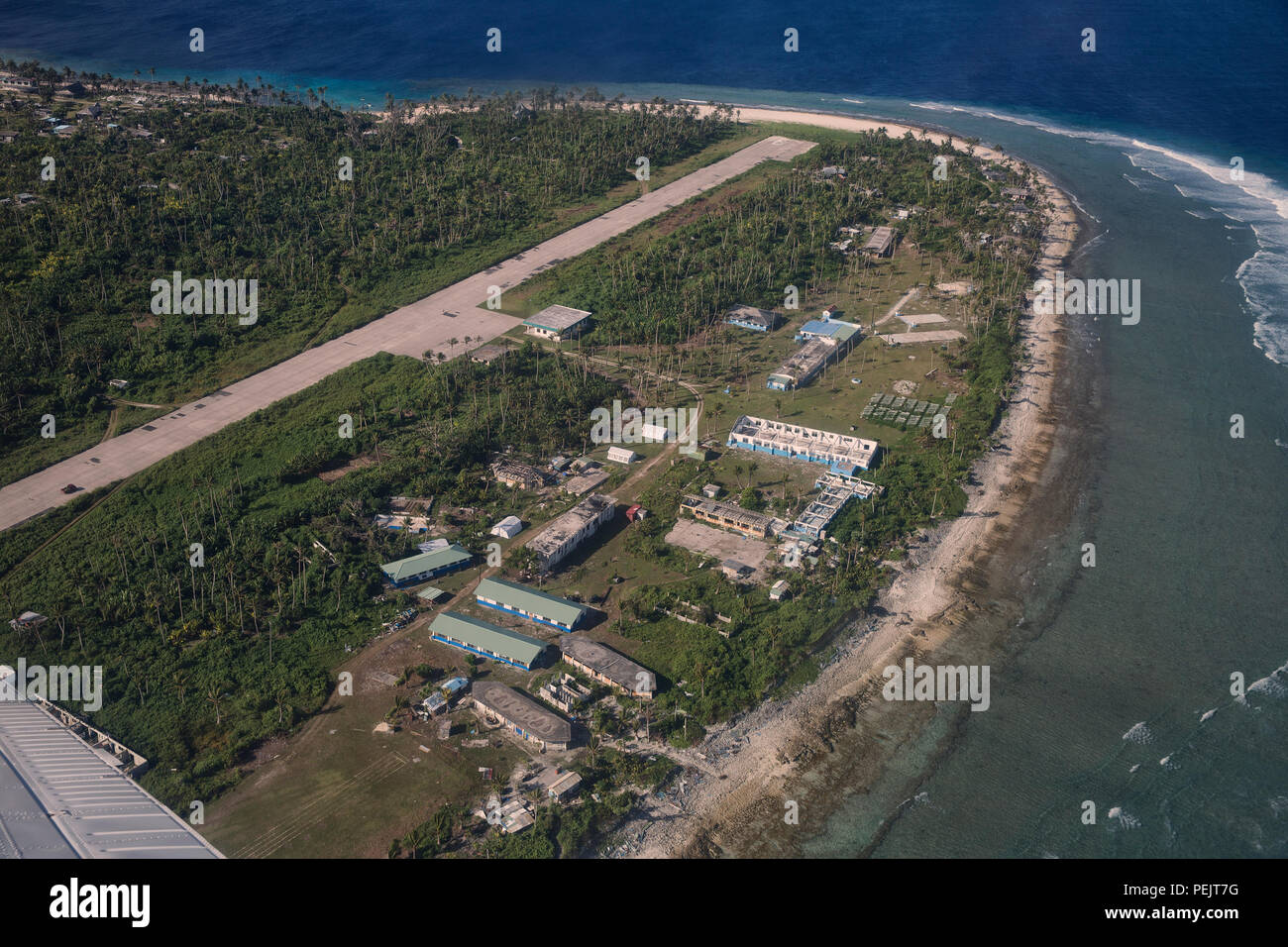 Aerial image of Falalop airfield and outer island high school, Falalop ...