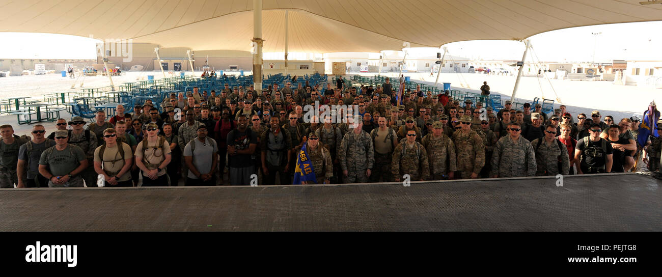 Members of Al Udeid Air Base, Qatar pose for a group photo before ...