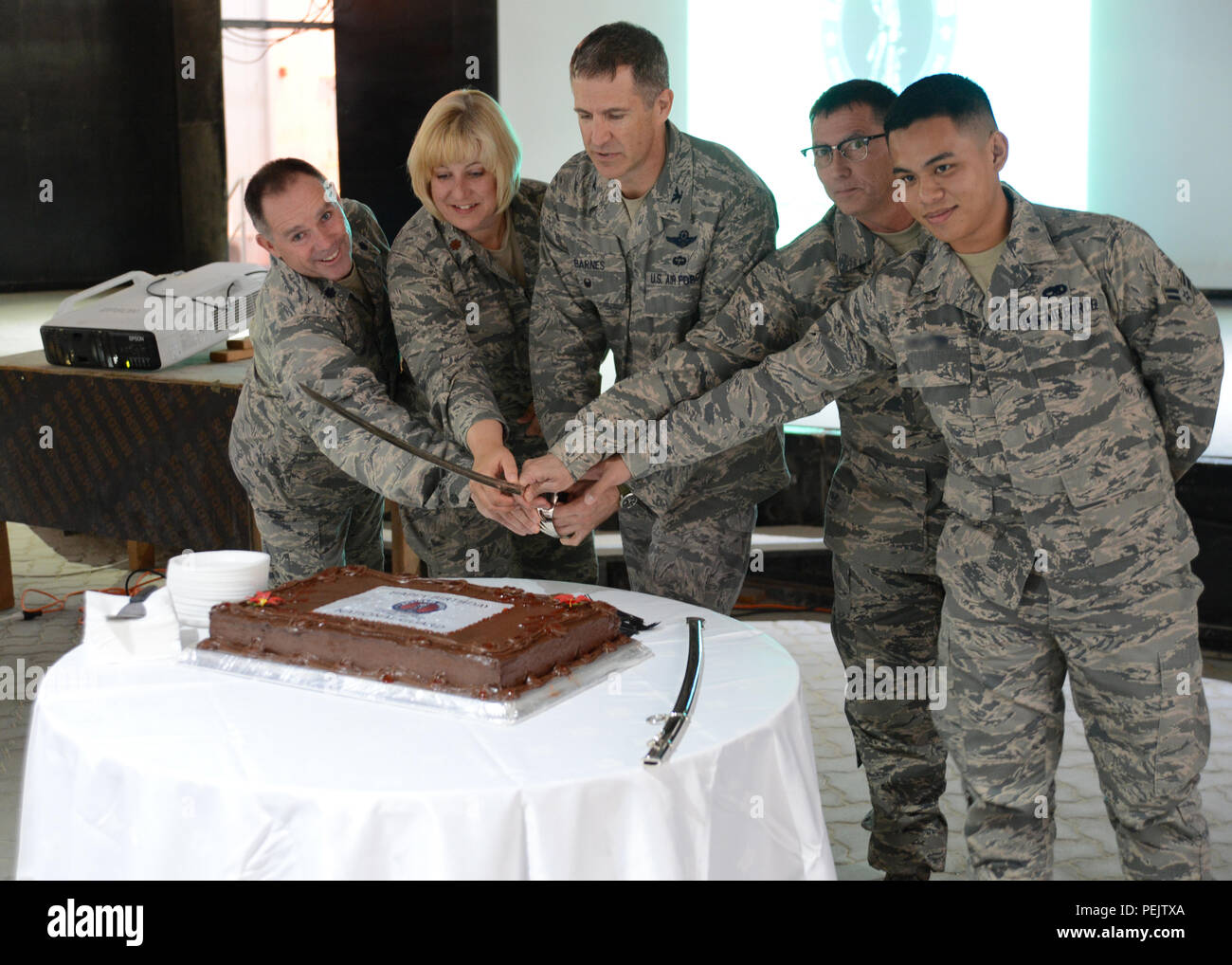 U.S. Air Force Col. Johnny Barnes (center), 380th Air Expeditionary ...