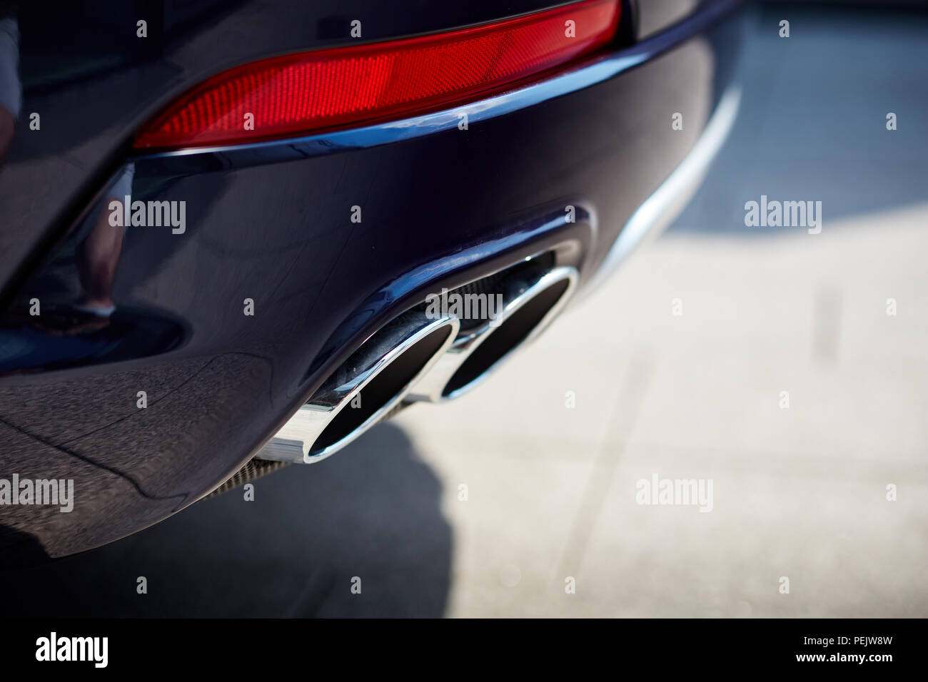 Exhaust pipe of sport's modern car Stock Photo - Alamy