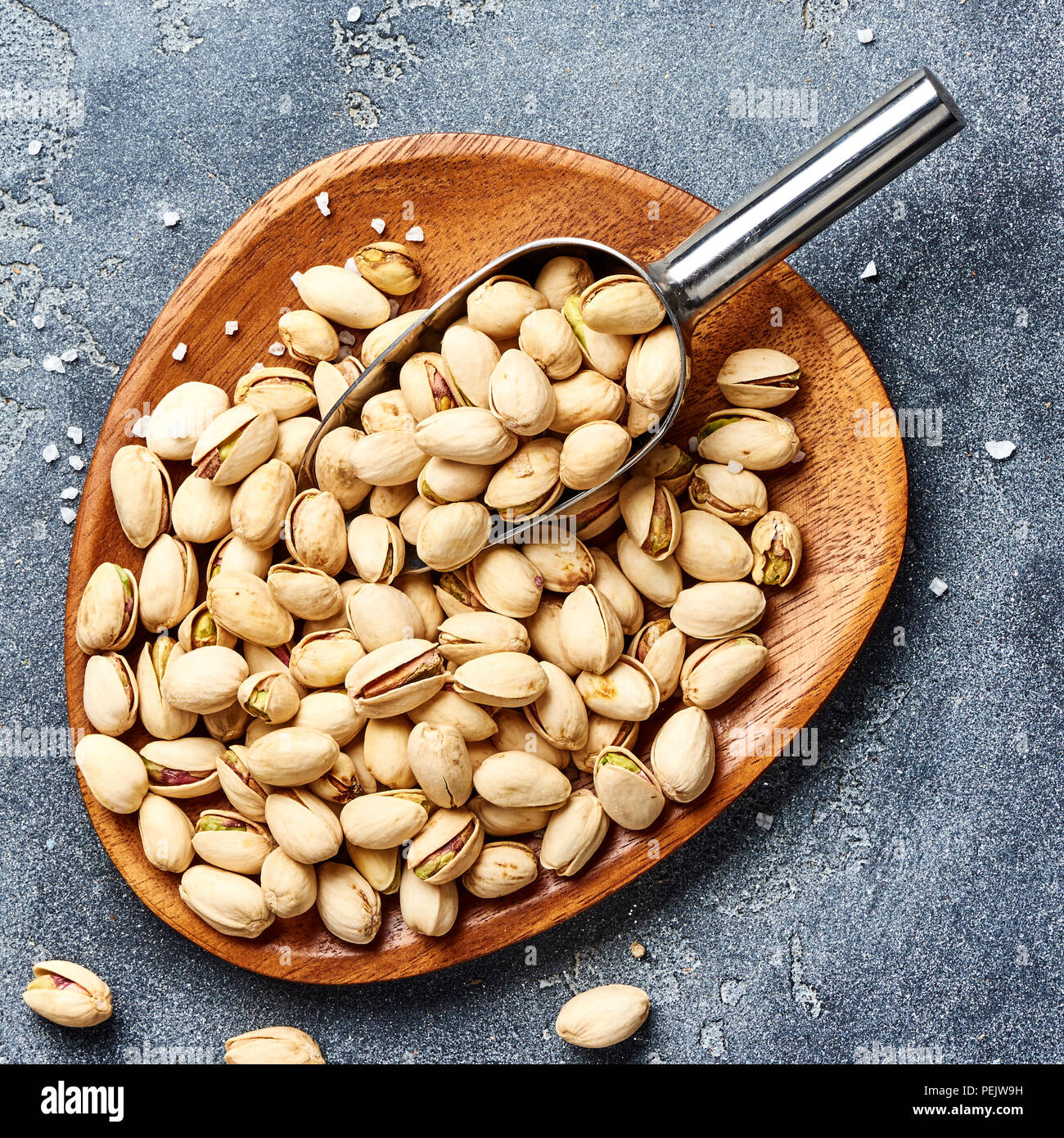 Salted Pistachios nuts. Top view of snacks Stock Photo - Alamy