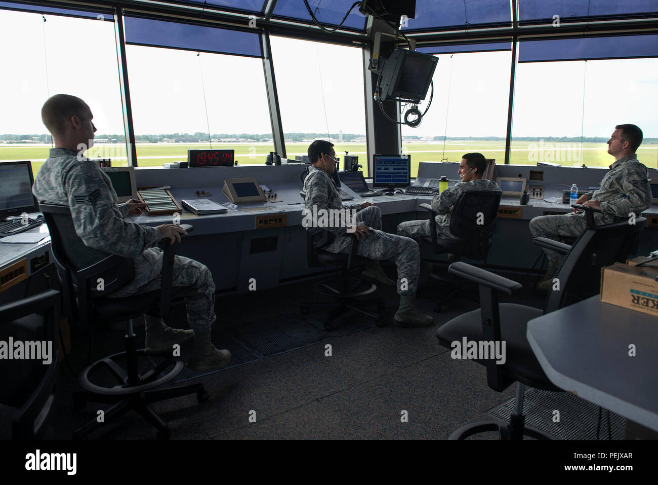 Air traffic controllers sit in the Tower Cab Aug. 11, 2015, at Moody ...